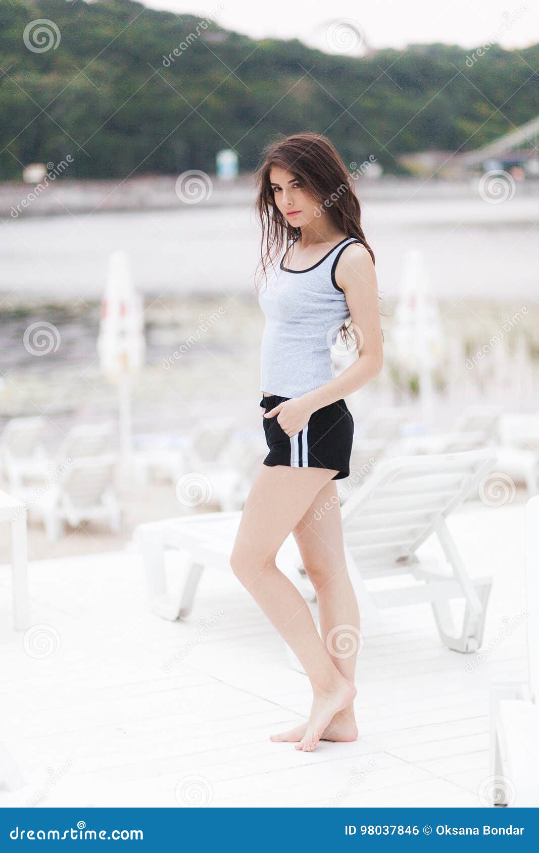 Summer Fashion Portrait Of Stunning Woman With Tanned Fit Body Wearing