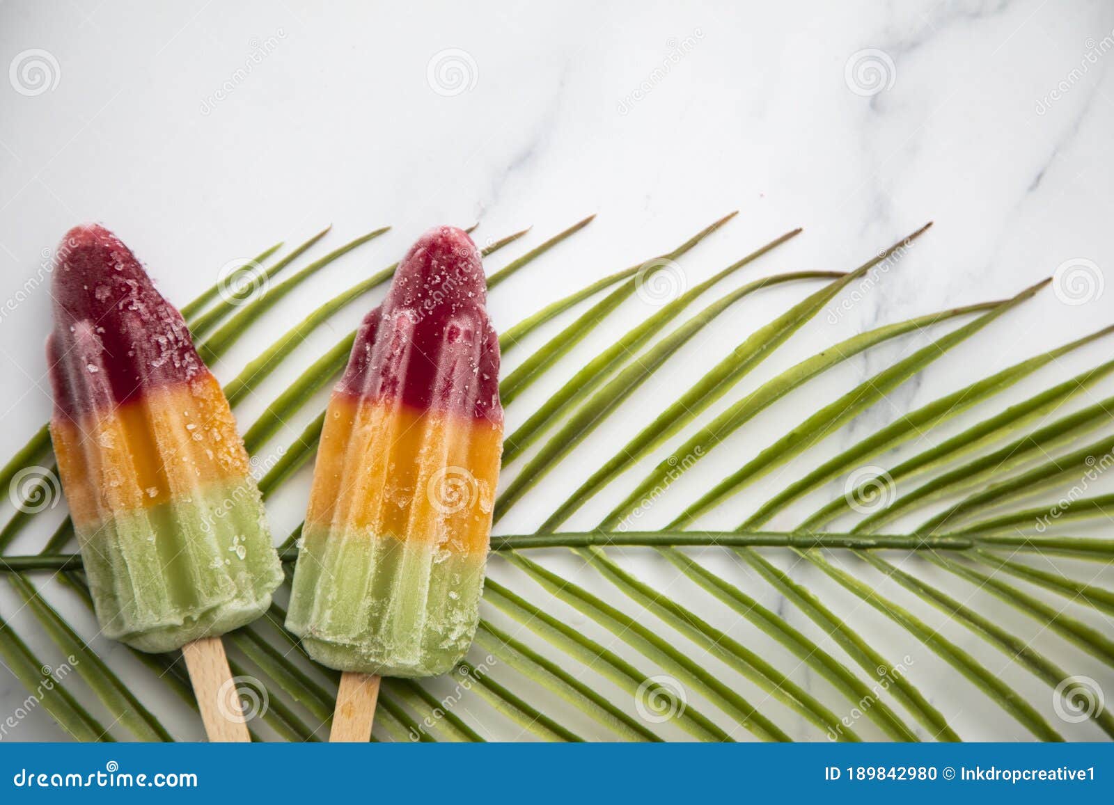 Summer Fruit Ice Lollies on a Tropical Palm Leaf Stock Photo - Image of ...