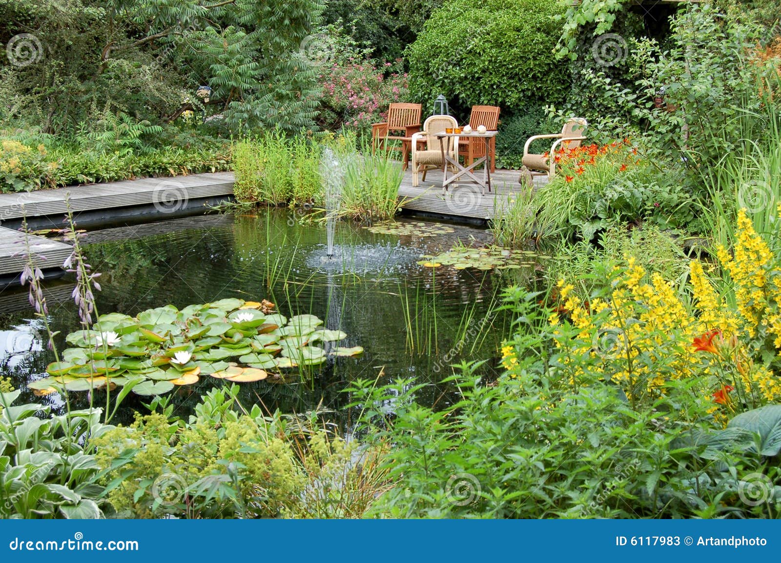 Summer Garden with a Pond stock image. Image of garden - 6117983