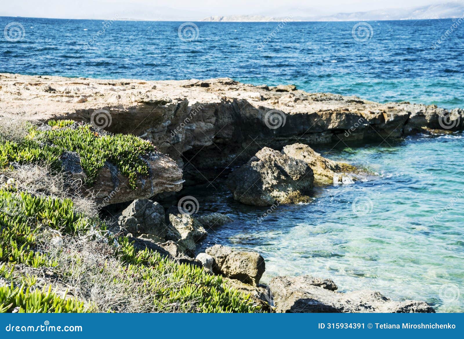 Summer Greek Blue Sea with Rocky Ledge and Greenery Stock Image - Image ...