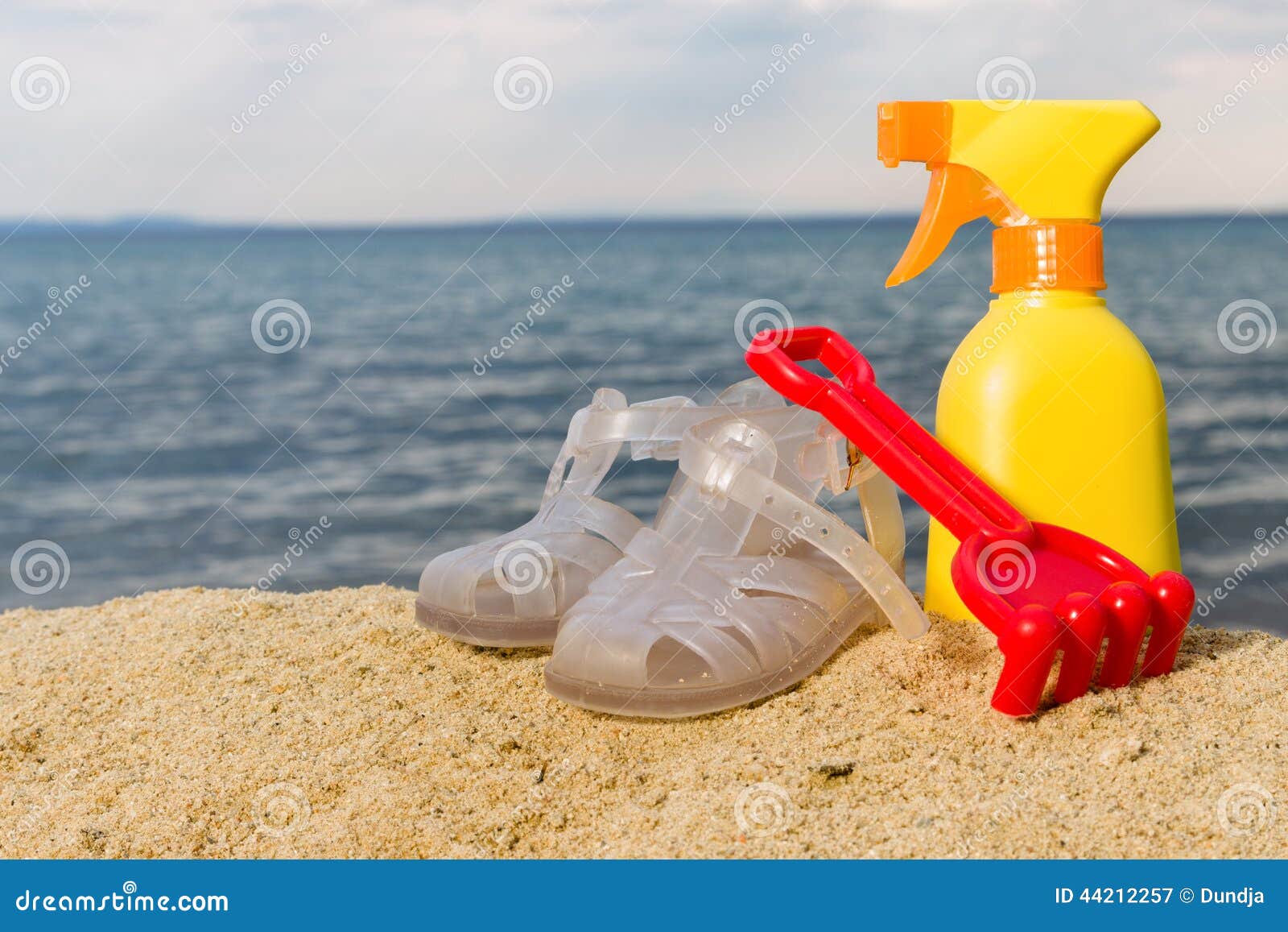Summer items on the beach stock image. Image of item - 44212257