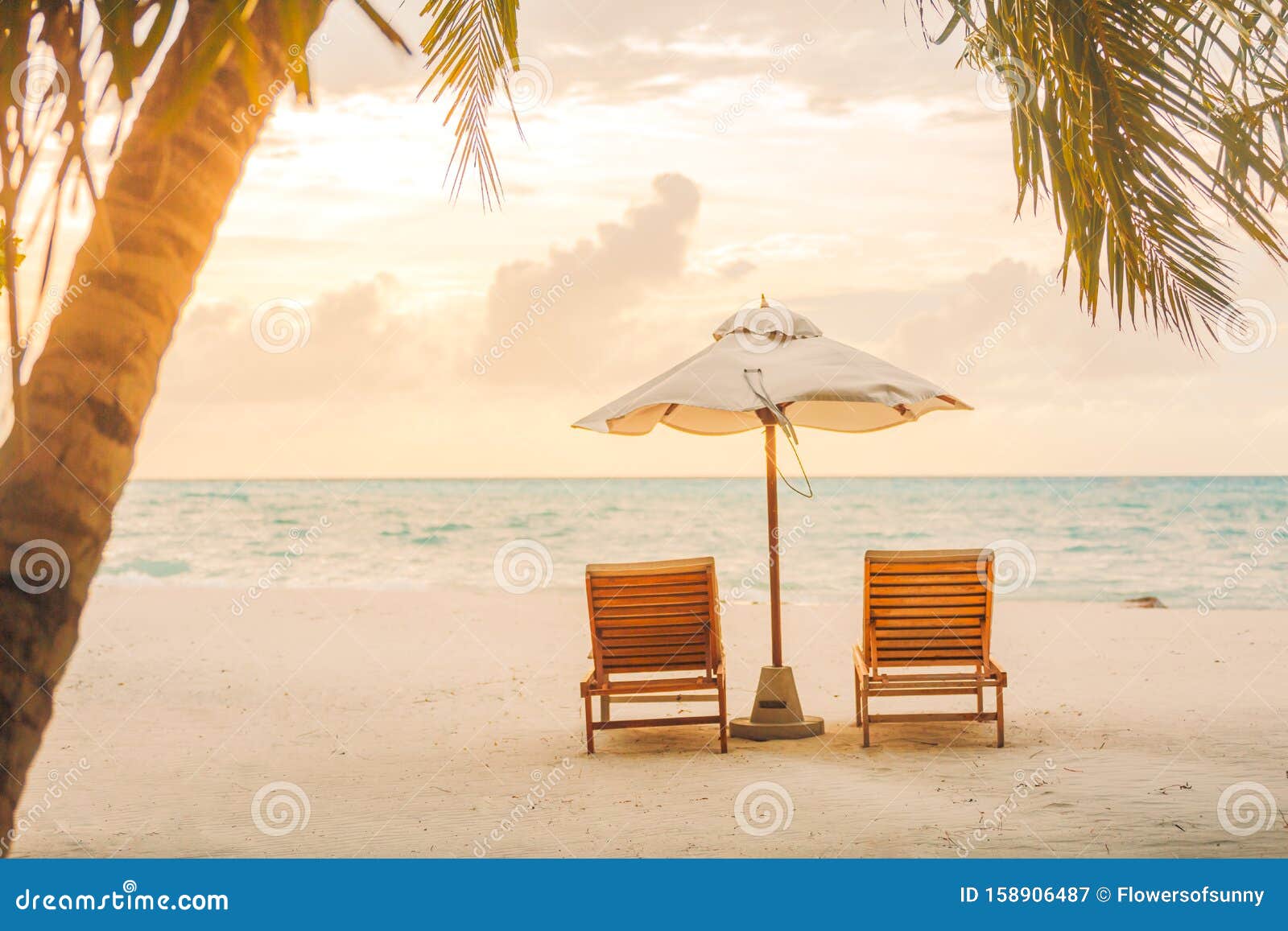 Tropical Beach Sunset Romantic Landscape With Two Chairs And Umbrella
