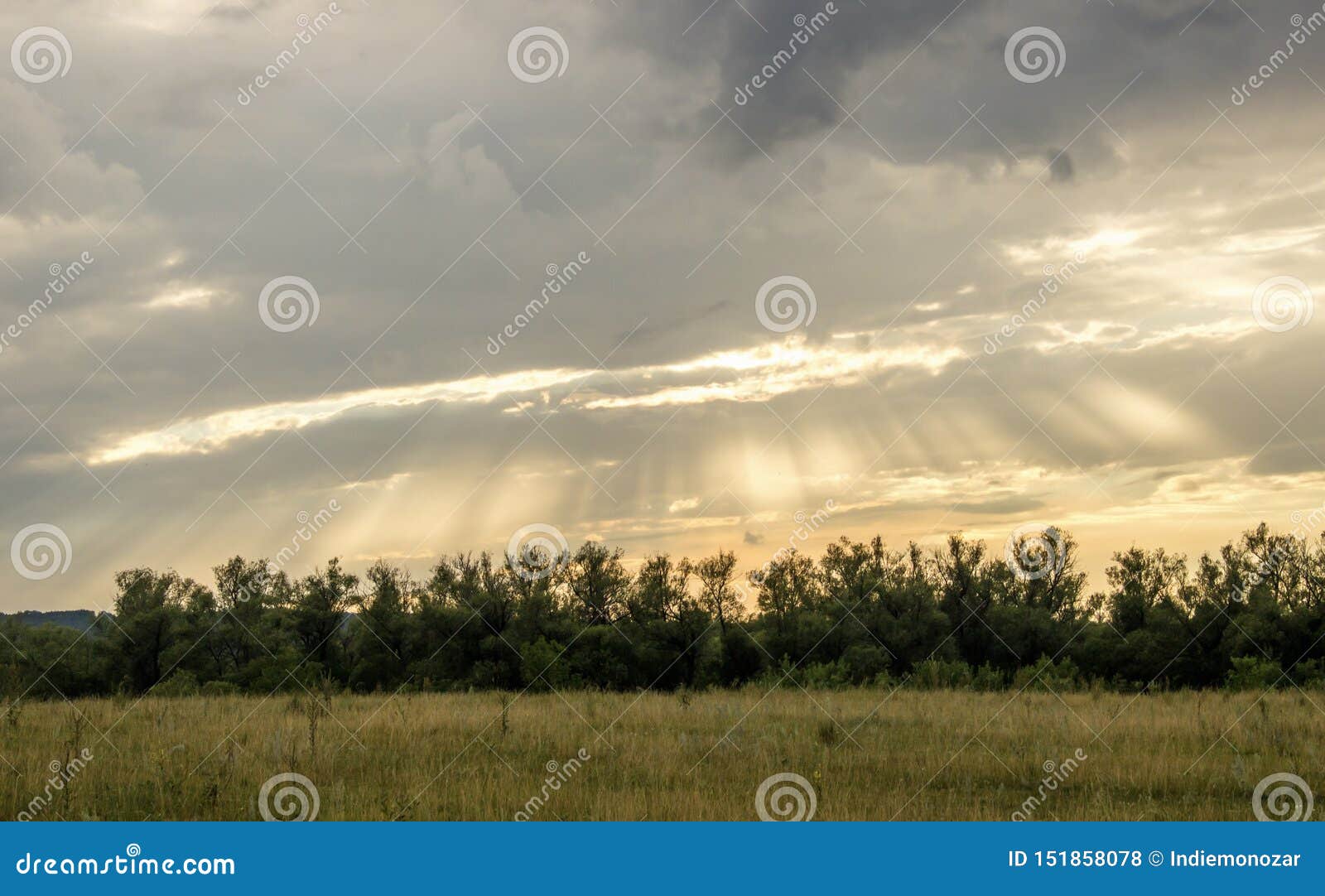 Summer Landscape in Cloudy Day. Sun Rays through the Heavy Clouds Stock ...