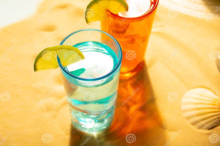Summer Non Alcoholic Cocktails In Colorful Glasses On Beach With White