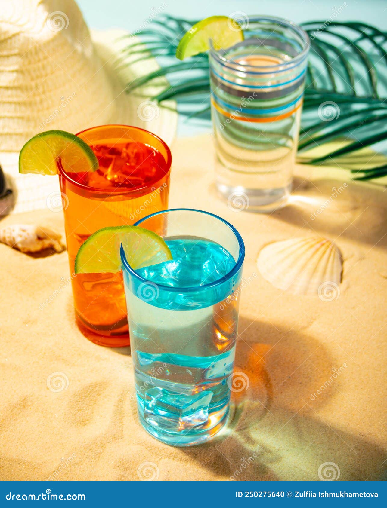 Summer Non Alcoholic Cocktails In Colorful Glasses On Beach With White