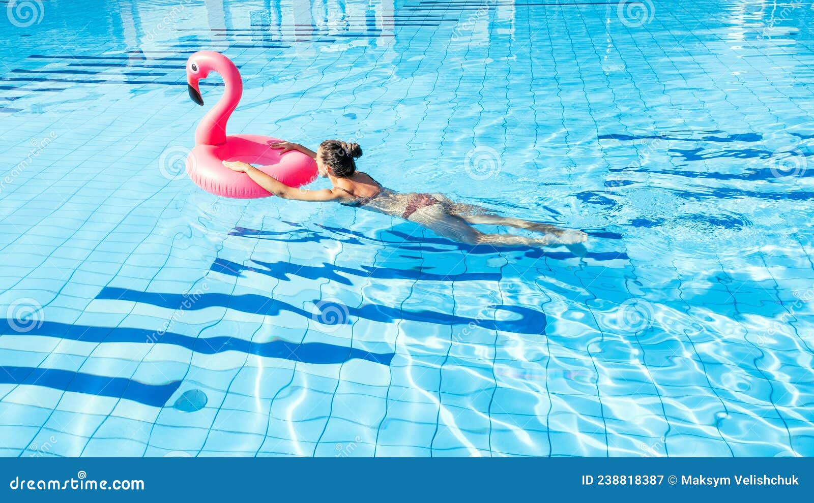 Summer Pool Relaxing Young Woman In Bikini Swimsuit Float With Pink
