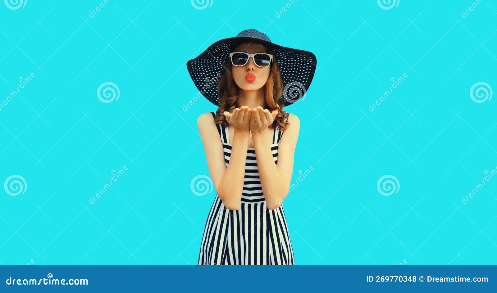 Summer Portrait Of Beautiful Young Woman Model Blowing Her Lips Sending