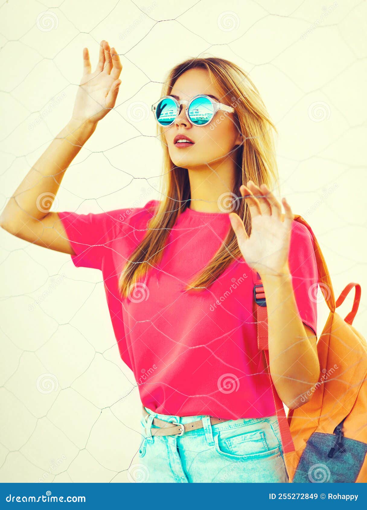 Summer Portrait Of Stylish Blonde Young Woman Wearing Backpack