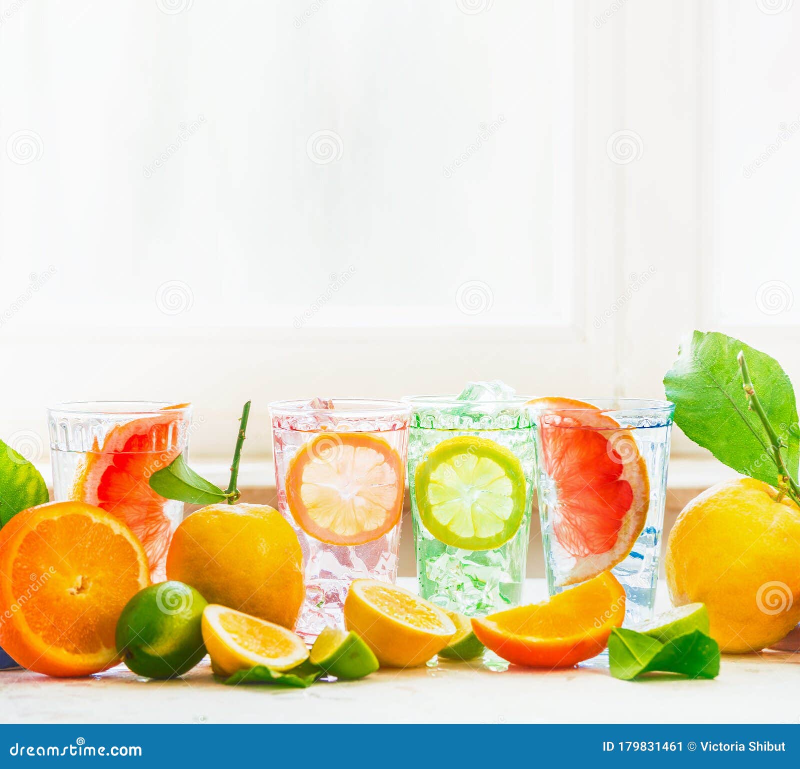 Summer Refreshing Drinks Party in Sunlight on White Table with Various ...