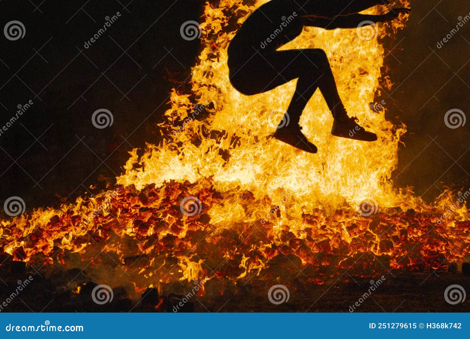 Summer Solstice Celebration Jumping into the Fire. Burning Flames Stock ...