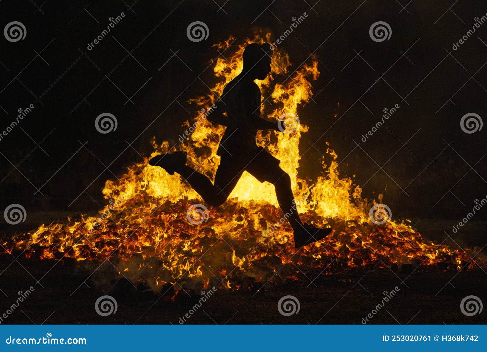 Summer Solstice Celebration Jumping into the Fire. Burning Flames Stock ...