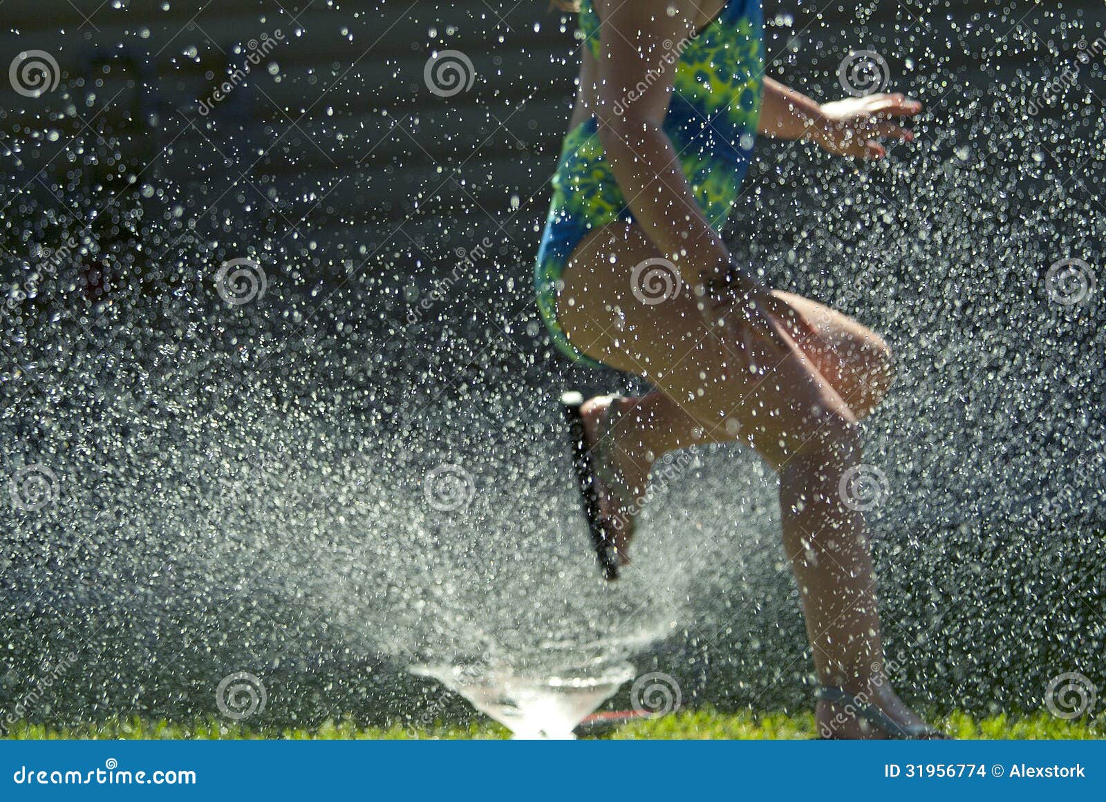 Summer Sprinkler Fun stock photo. Image of refreshing - 31956774