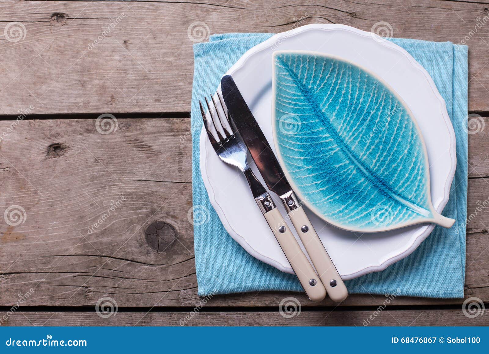 Summer Table Setting. Decorative Plate in Form of Leaf, Knife and Fork ...
