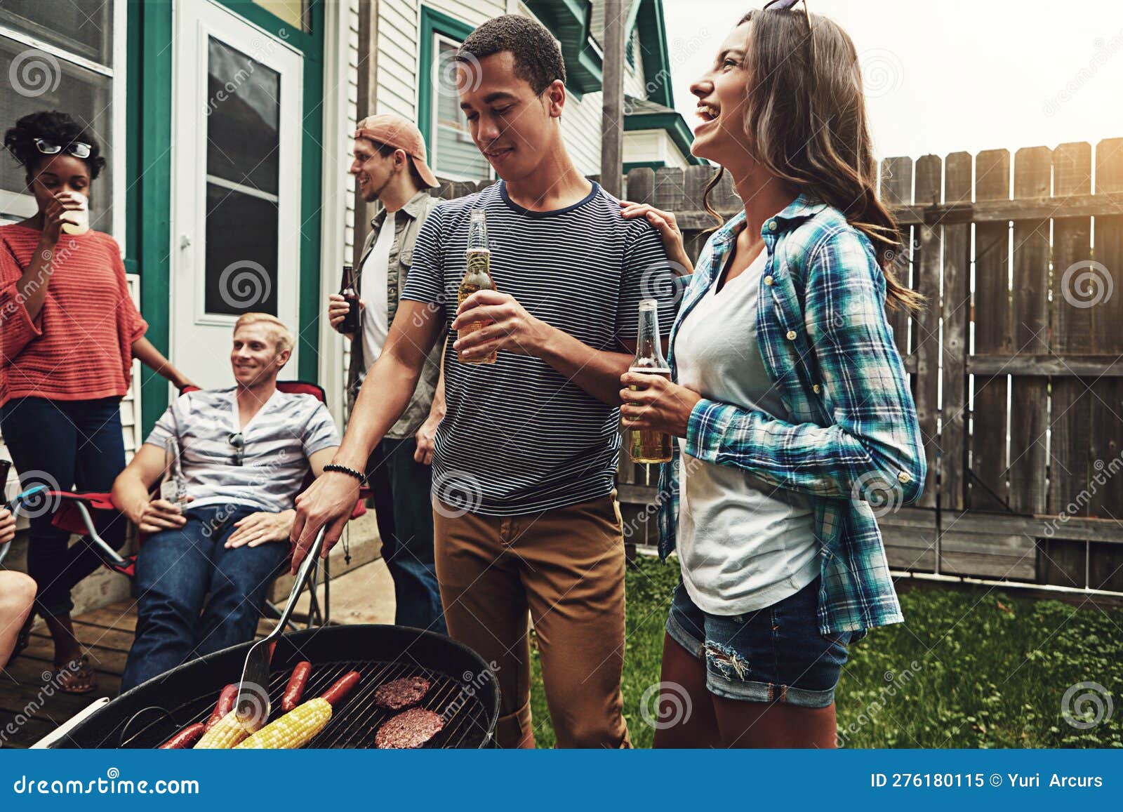 Summer Time is Cookout Time. a Group of Friends Having a Barbecue in ...