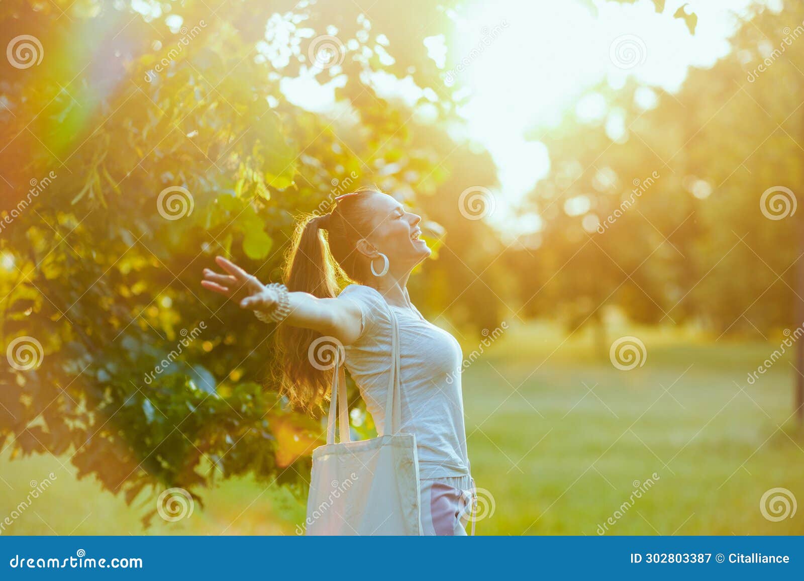 Smiling Elegant Woman in White Shirt Outside in Nature Stock Image ... Smiling Elegant Woman in White Shirt Outside in Nature Stock Image ...