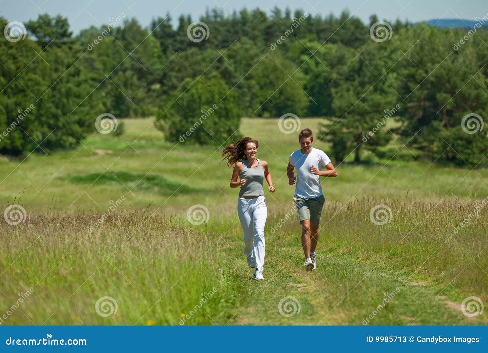 Summer - Young Couple Jogging in the Nature Stock Image - Image of ...