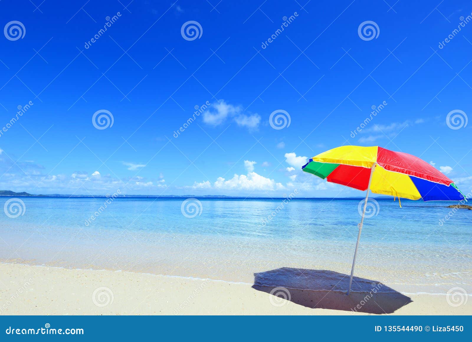 Summertime at the beach stock photo. Image of seashore - 135544490