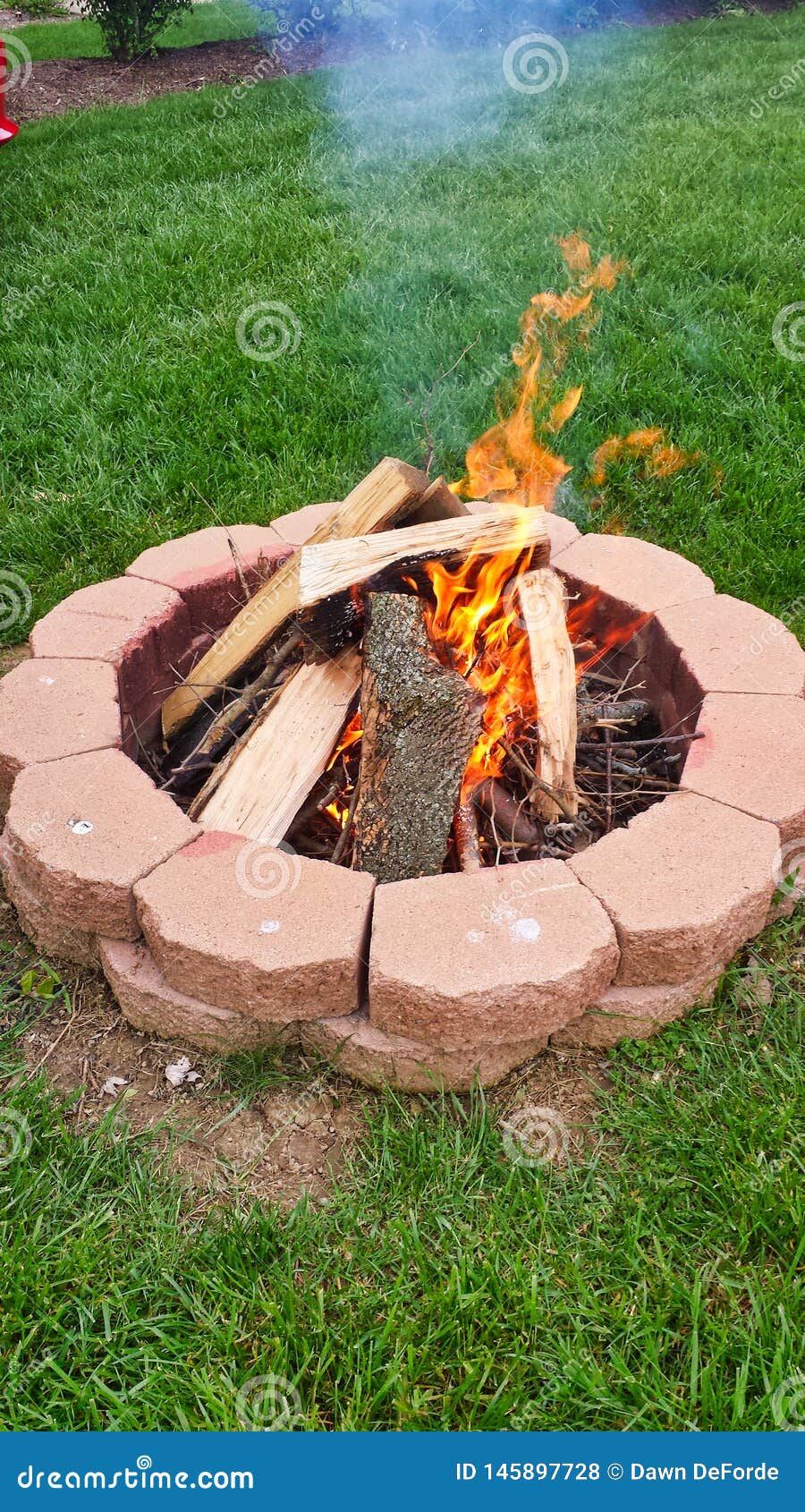 Summer Backyard Fire stock photo. Image of bricks, fire - 145897728