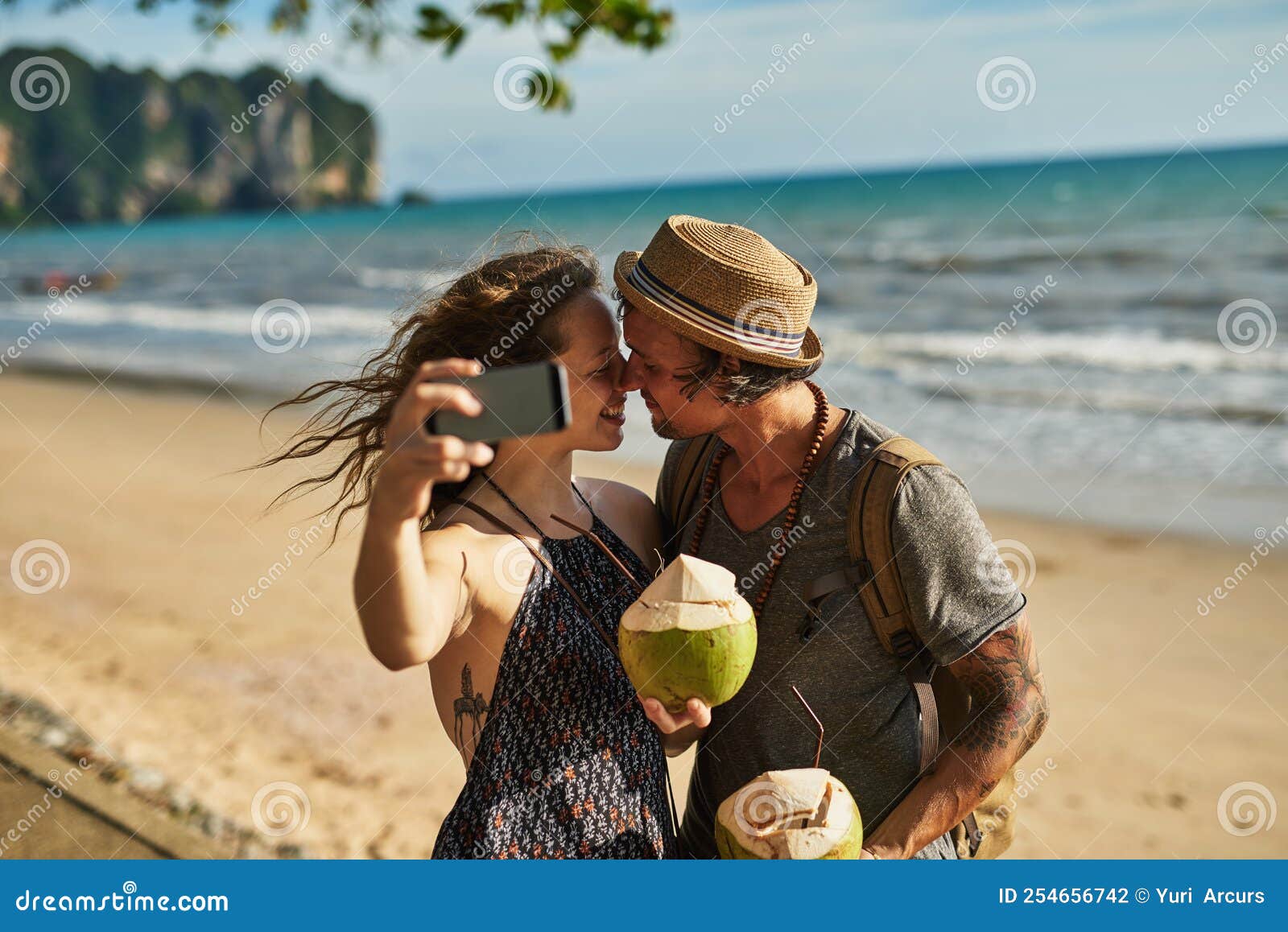 Summertime Is Selfie Time A Happy Young Couple Taking Selfies While