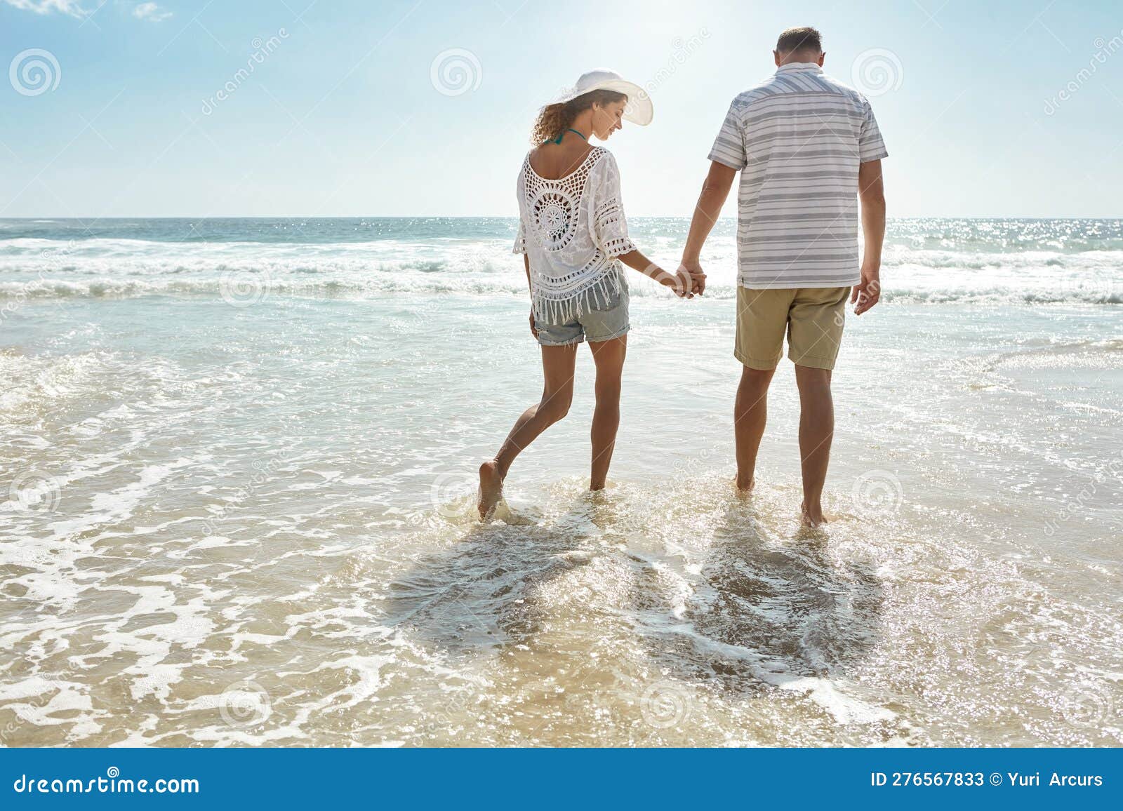 Summertime Strolls. a Mature Couple Walking Along the Beach. Stock ...