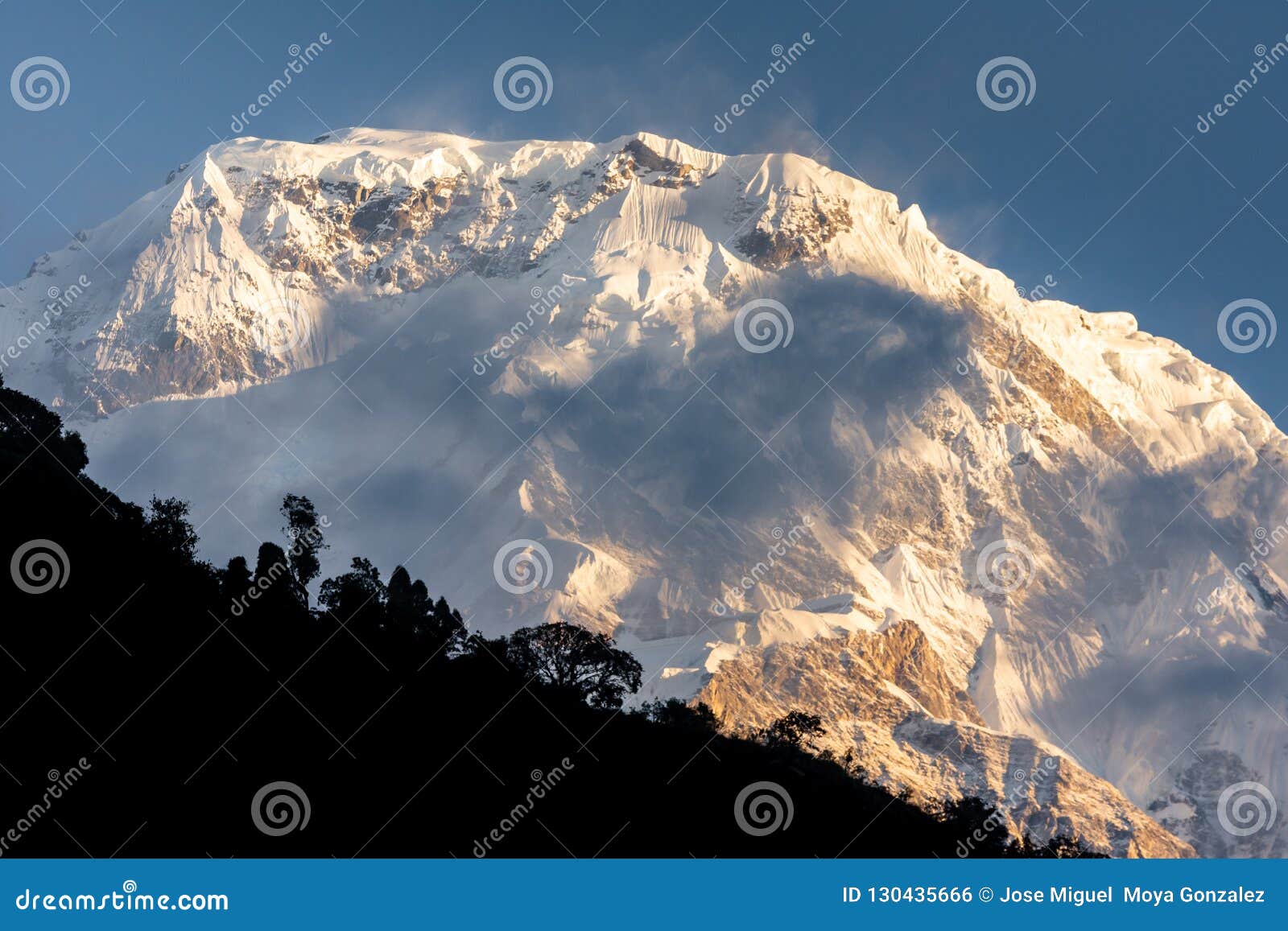 Summit of Annapurna South Surrounded by Clouds in the Himalayas Stock ...