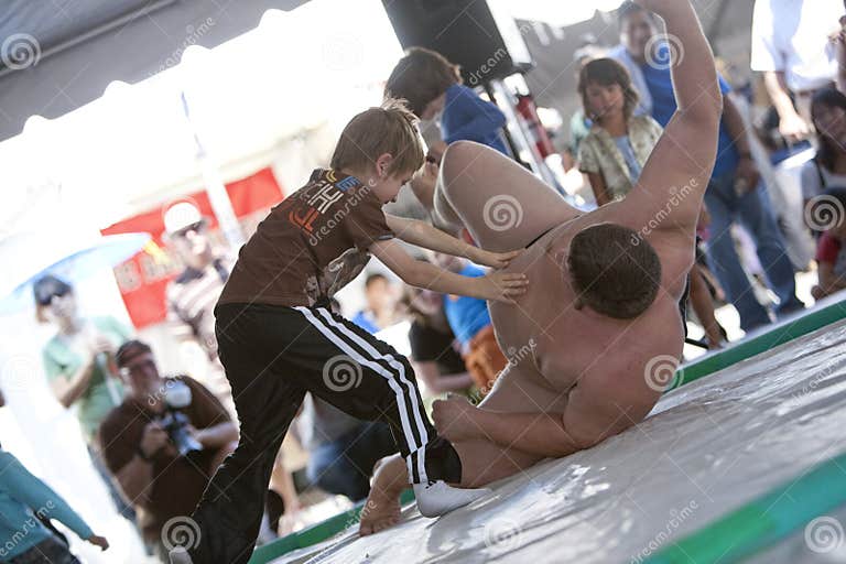 Sumo Wrestler and Child editorial photography. Image of culture - 9109287
