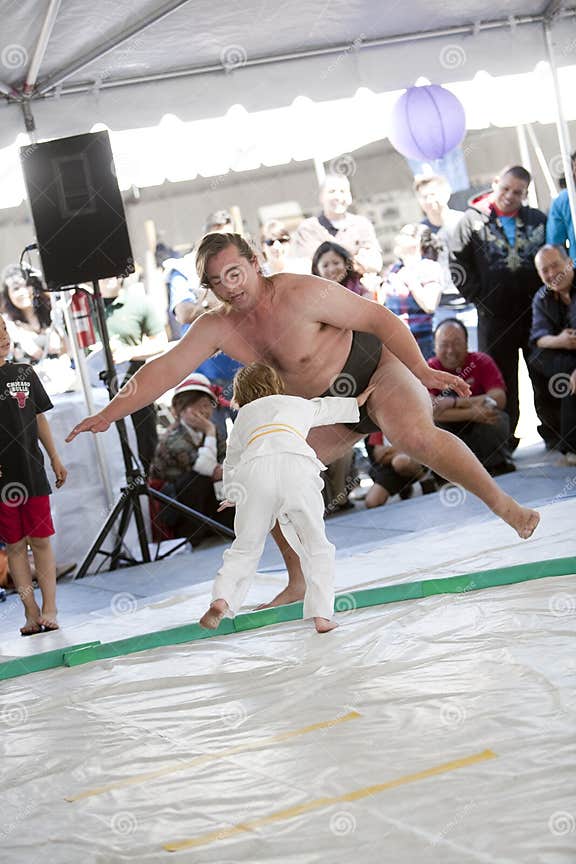 Sumo Wrestler and Child editorial photo. Image of culture - 9109311