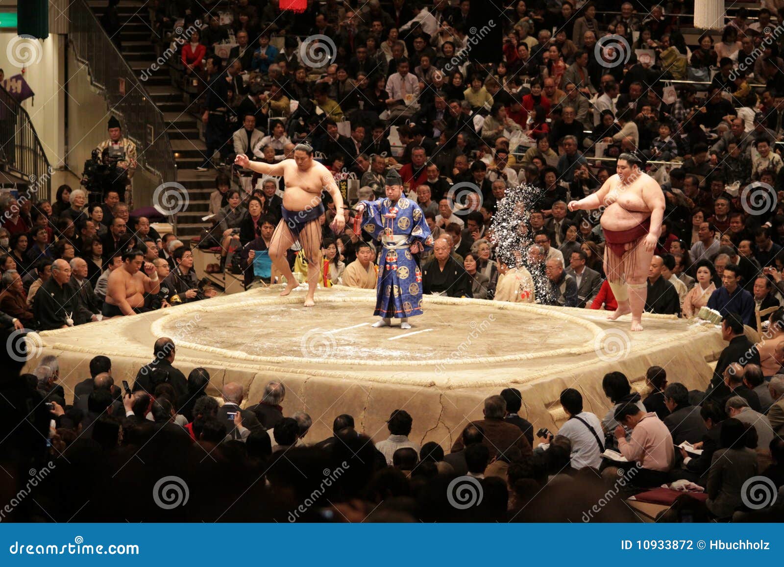 Sumo Wrestlers Throwing Salt in the Arena Editorial Photography - Image ...