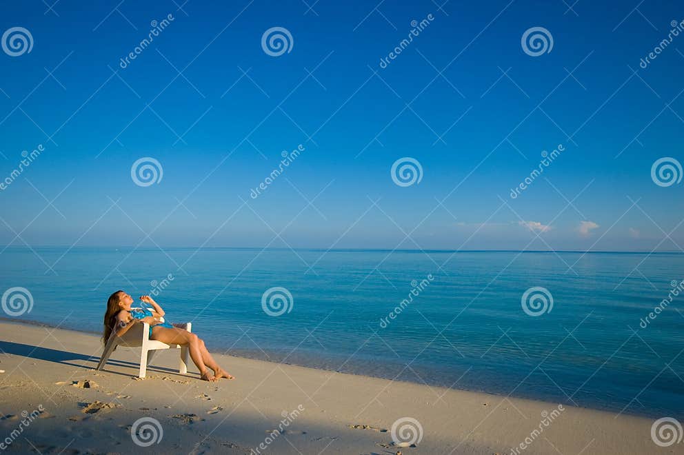 Sun bathing stock photo. Image of indian, leisure, coast - 4539148