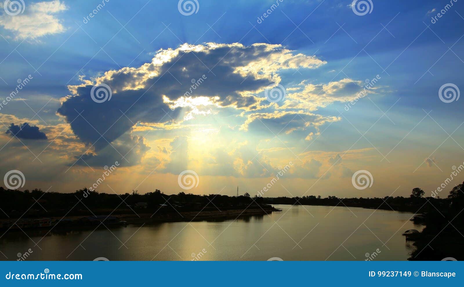 Sun Beams through Clouds at Sunset Stock Image - Image of water, river ...