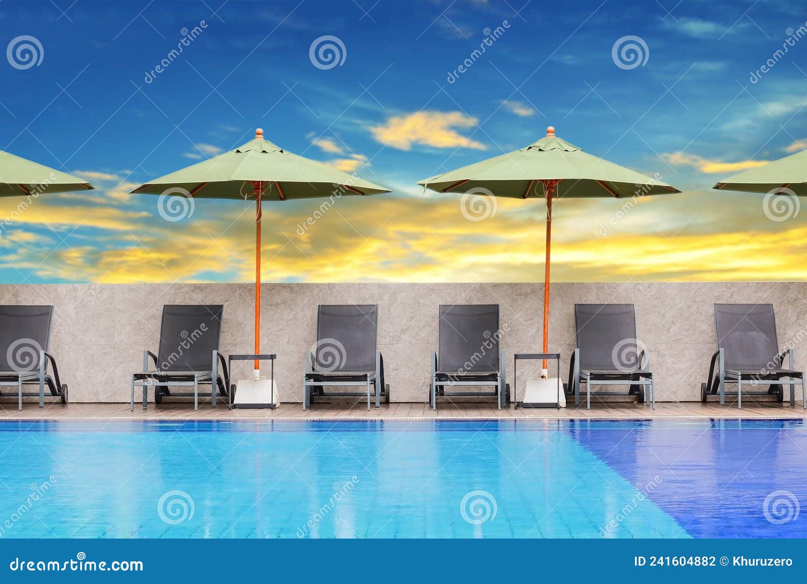 Sun Bed beside the Swimming Pool Stock Photo - Image of deck, holiday ...