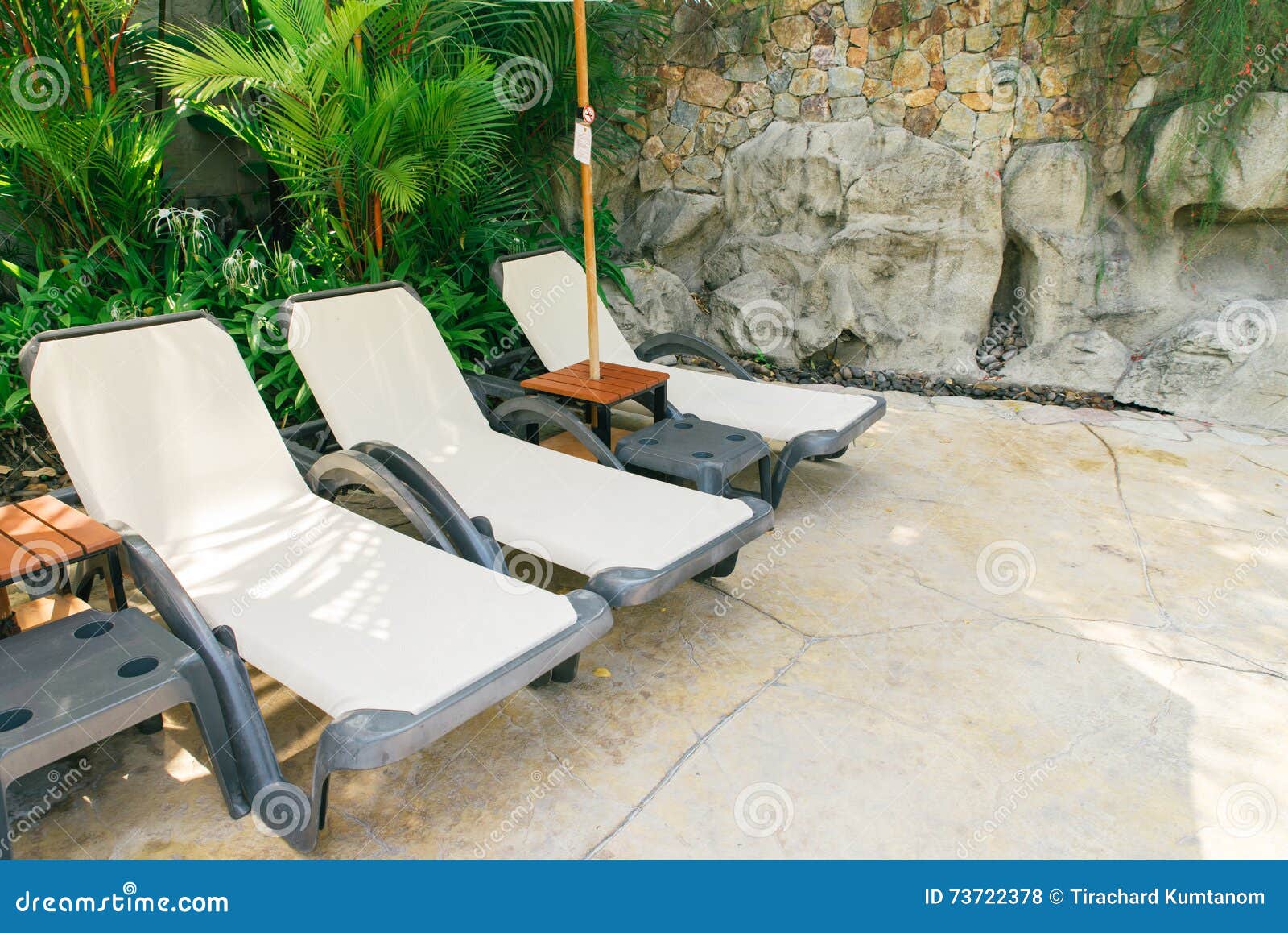 Sun Bed beside Swimming Pool. Stock Photo - Image of reflection, exotic ...