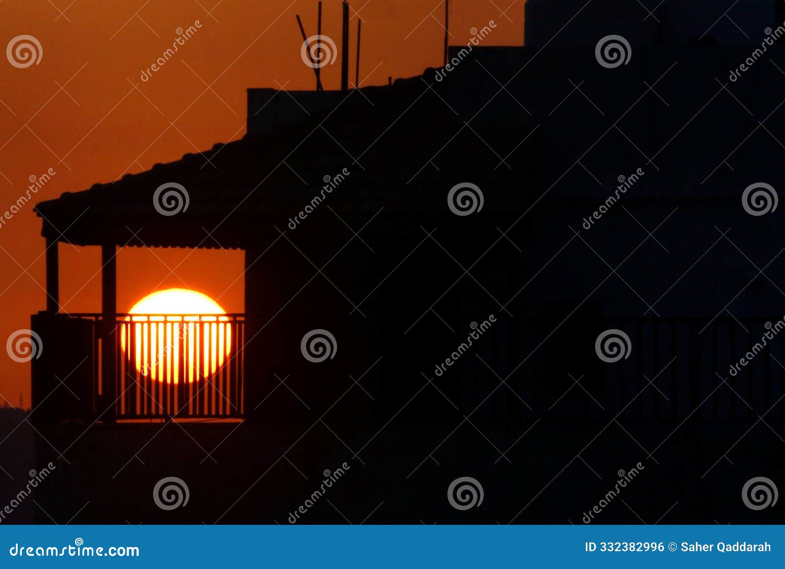 Sun behind balcony railing stock photo. Image of poster - 332382996