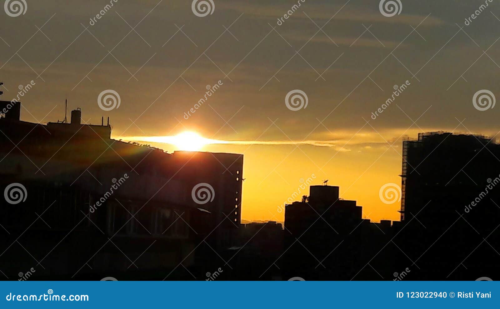 The Sun Behind the Building Stock Photo - Image of sunset, fhotography ...