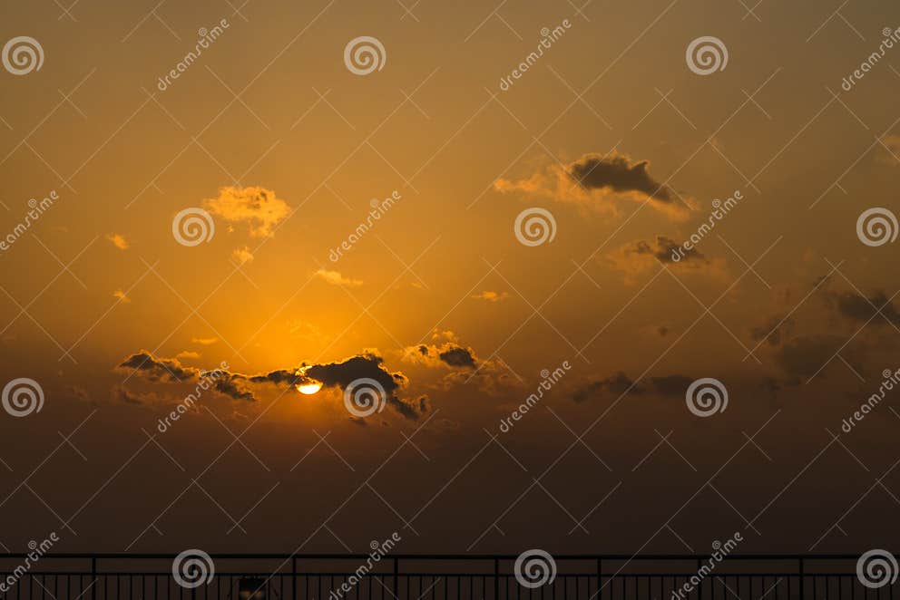 Sun Behind the Cloud from Building in the Evening View Stock Image ...