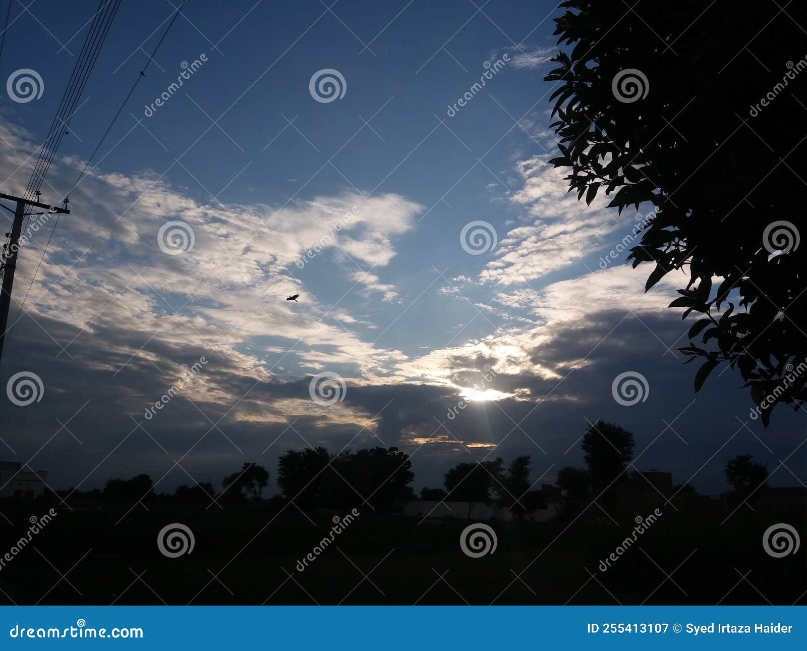 Sun is behind clouds stock image. Image of nature, evening - 255413107