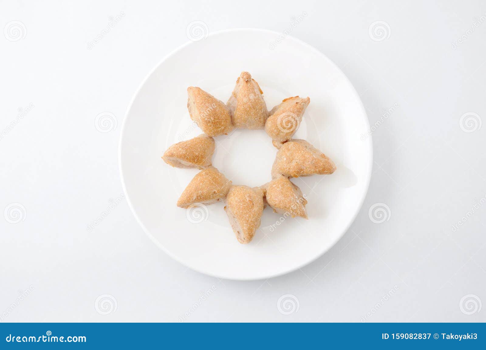Sun Bread on a Plate on White Background Stock Image - Image of baked ...
