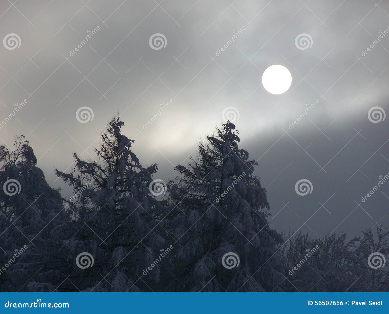 Sun on a cloudy winter sky stock photo. Image of cloudy - 56507656