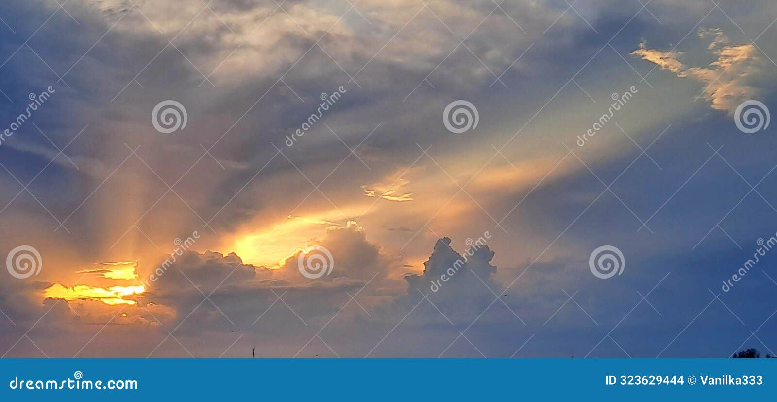 The Sun Coming Out from Behind the Clouds Stock Photo - Image of ...