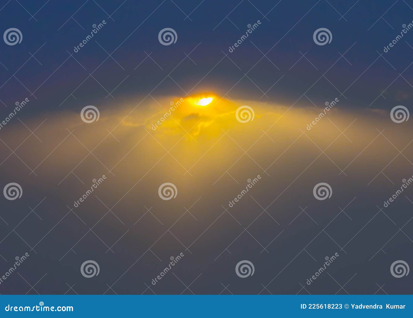Sun coming out of clouds stock image. Image of light - 225618223