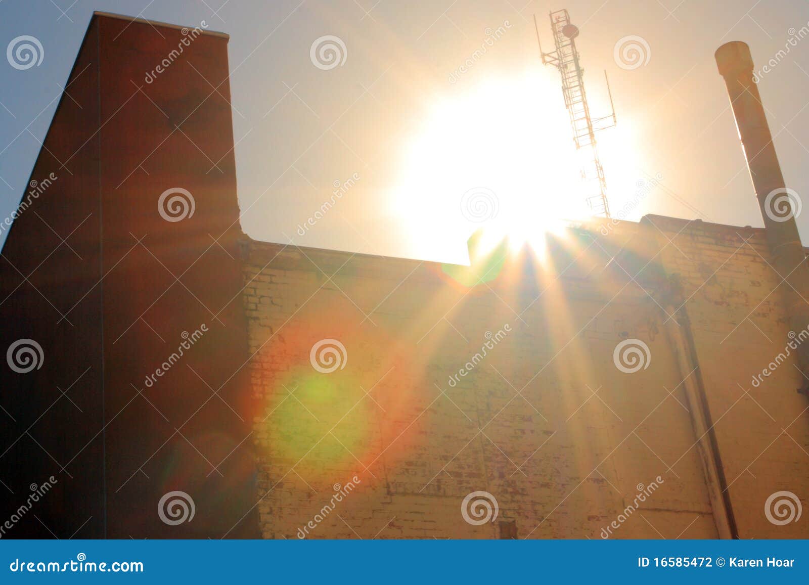 Sun Coming Up Over Brick Building Stock Photo - Image of outdoors ...