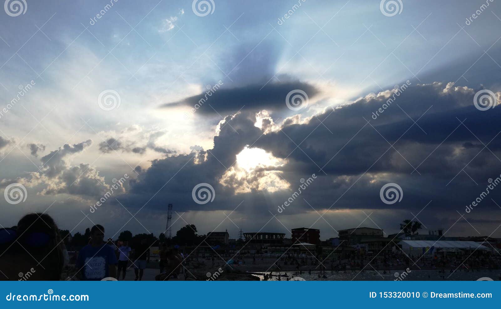 Sun covered in clouds stock photo. Image of clouds, seaside - 153320010