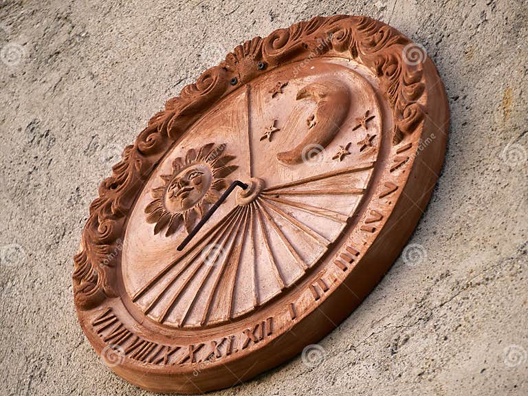 Sun dial solar wall clock stock photo. Image of clock - 36315056