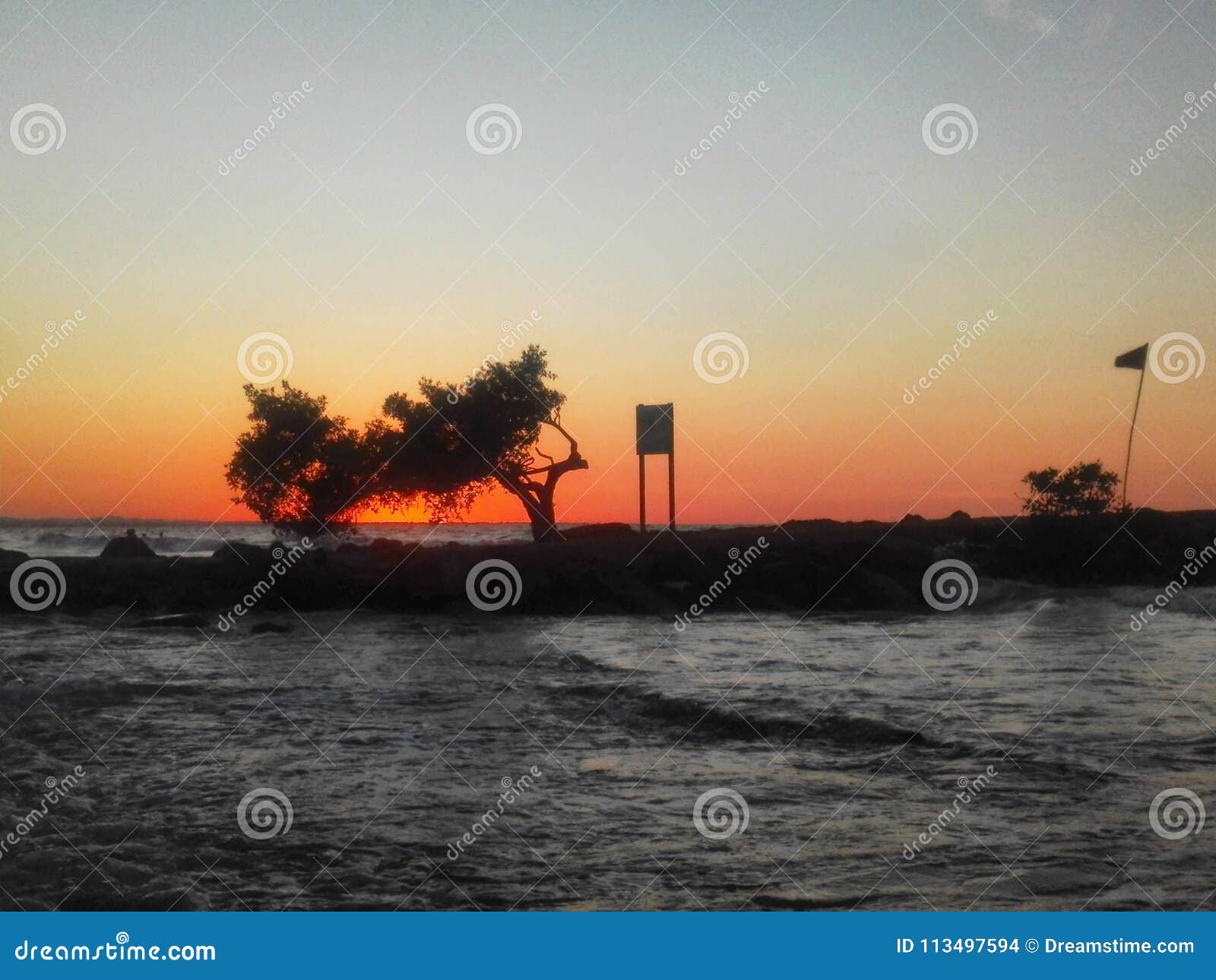 Sun is down stock photo. Image of nature, beach, sunset - 113497594