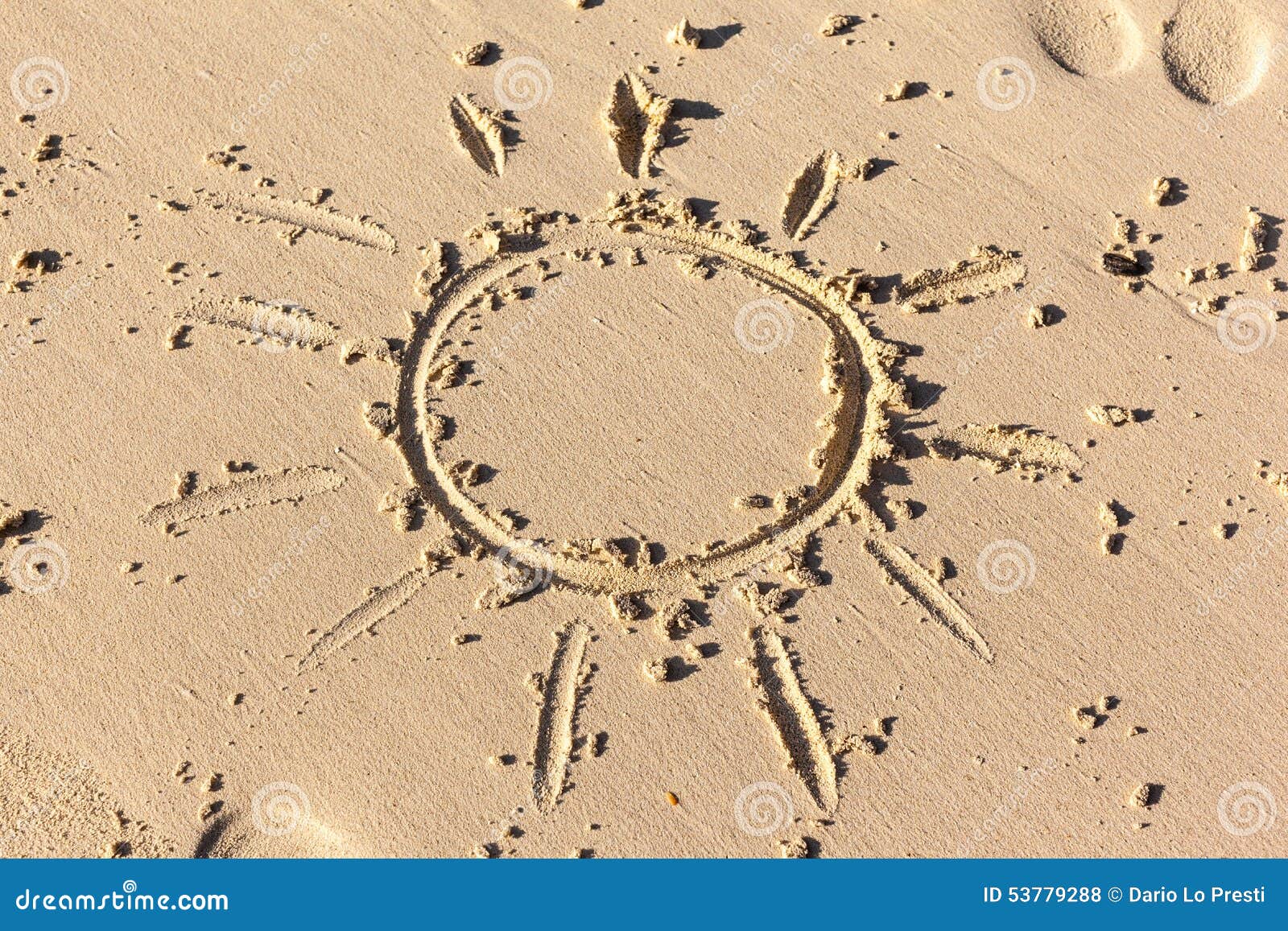 Sun drawing on the sand stock photo. Image of sketch - 53779288
