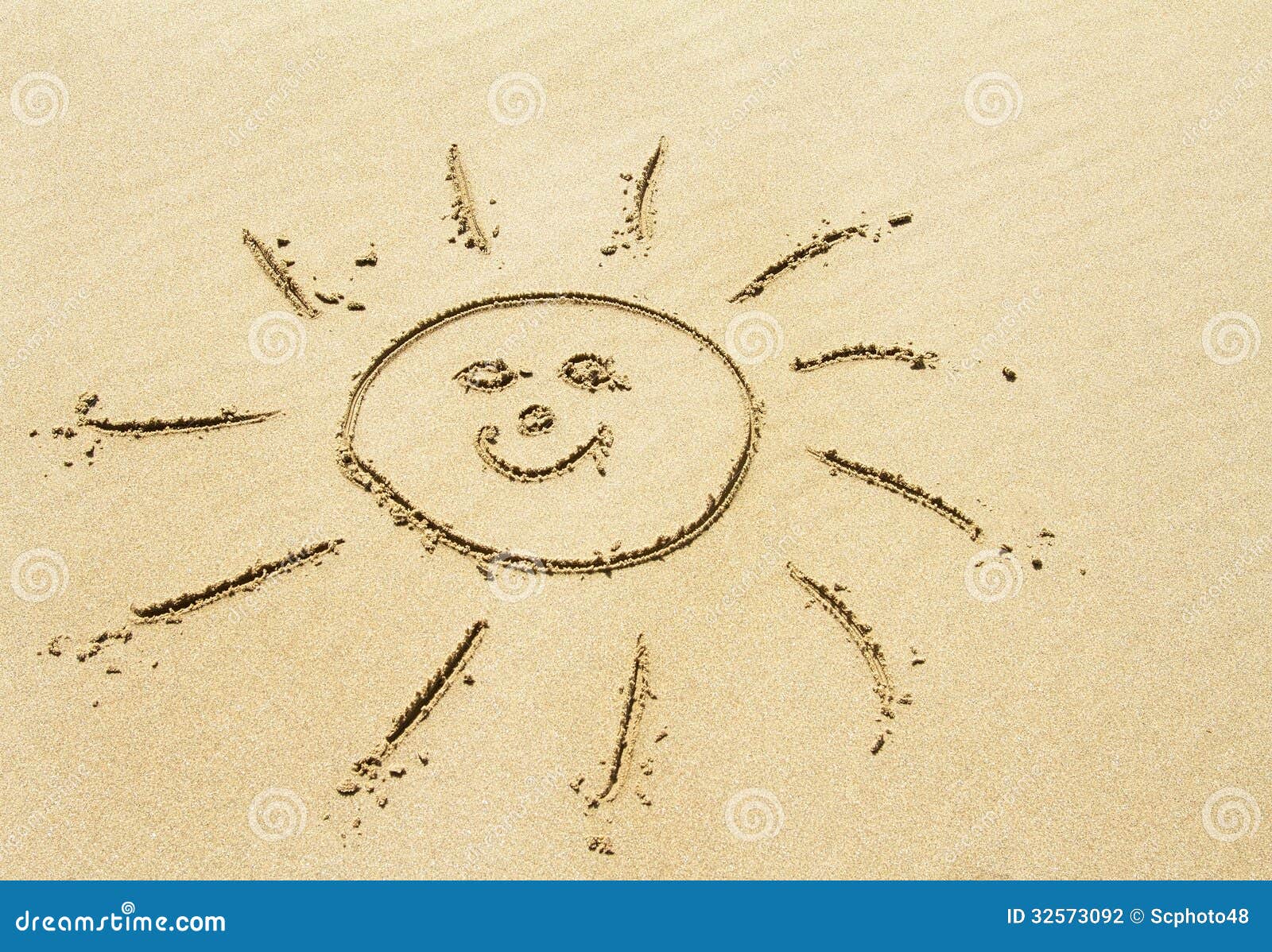 Sun drawing on sandy beach stock photo. Image of grainy - 32573092