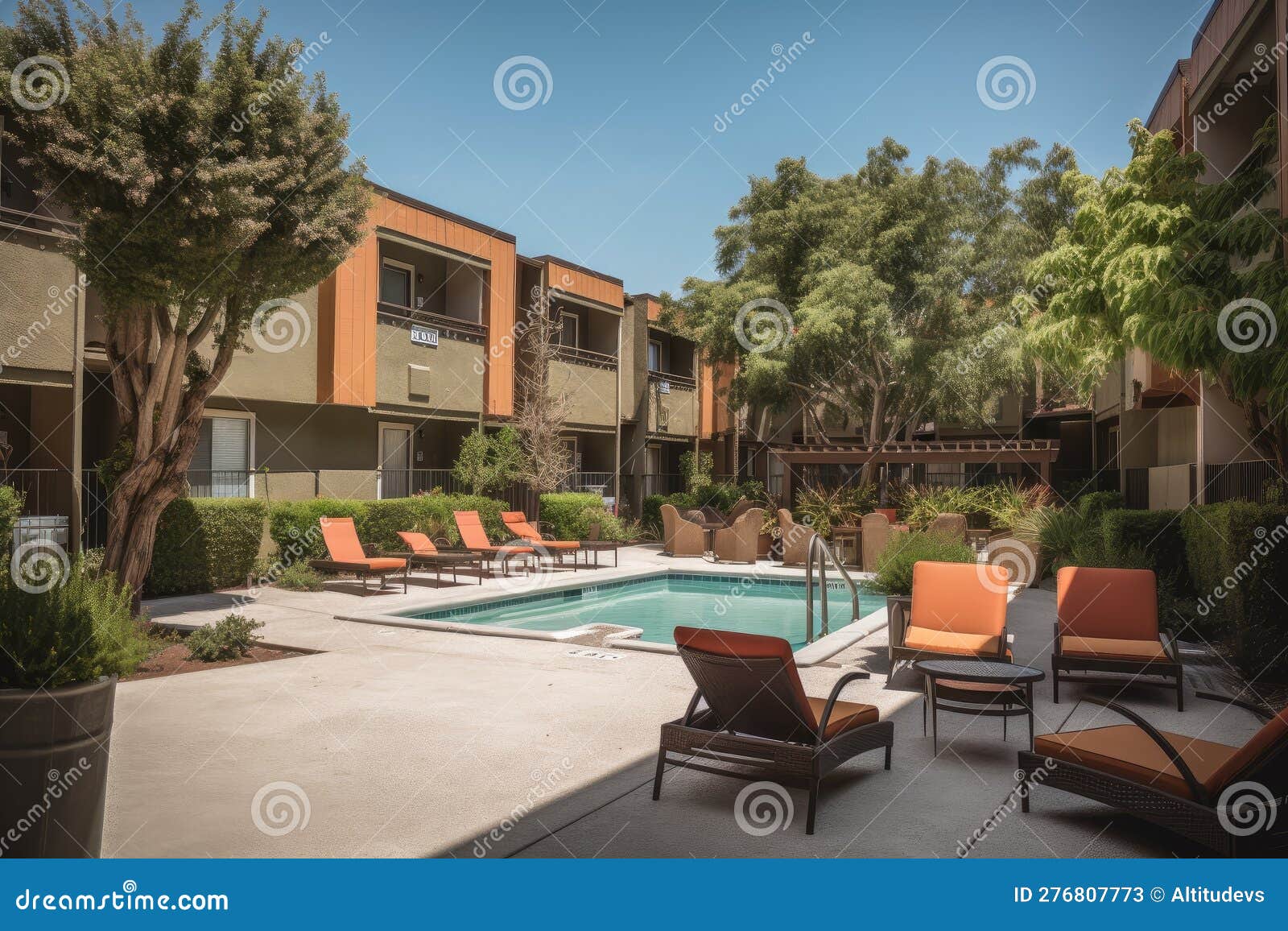 Sun-drenched Courtyard with Cozy Seating and a View of the Pool Stock ...