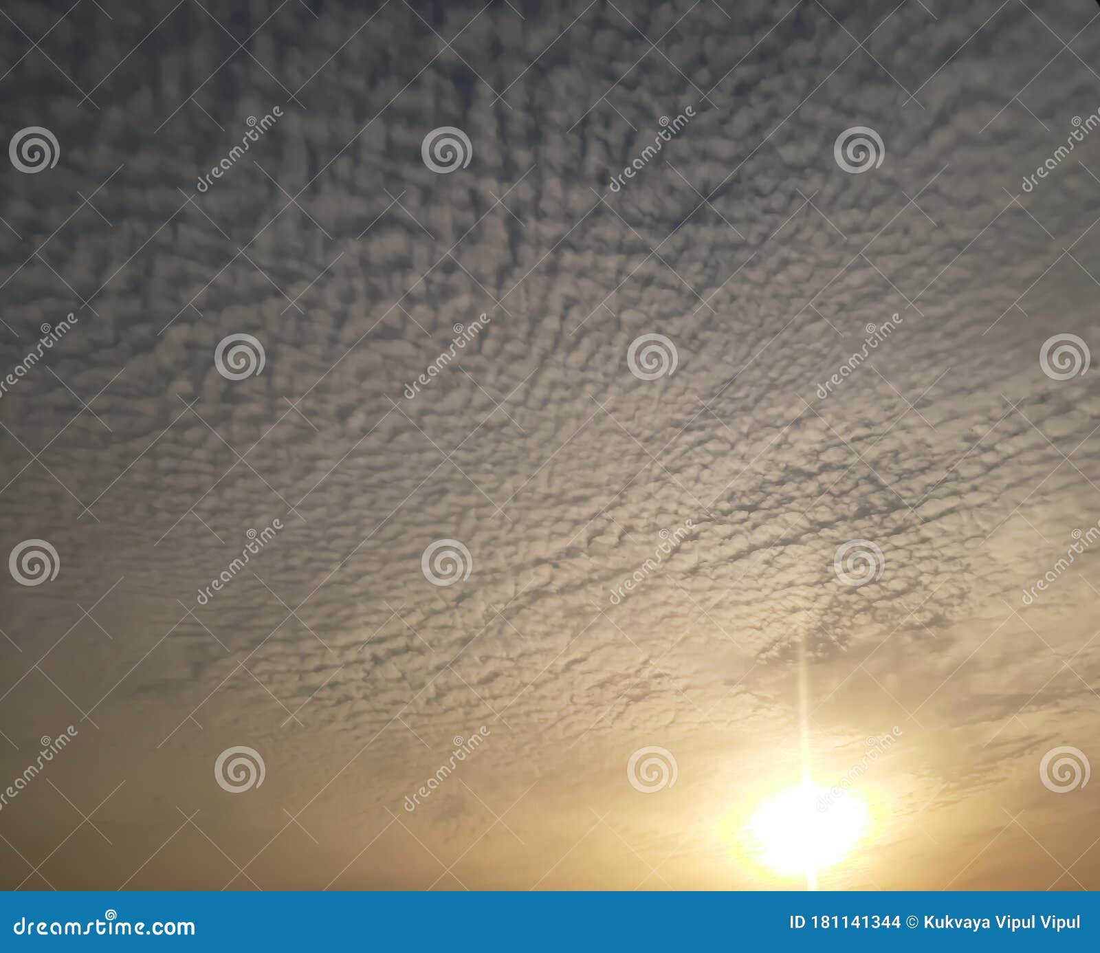 The Sun Filled with Clouds in the Evening Time. Stock Photo - Image of ...