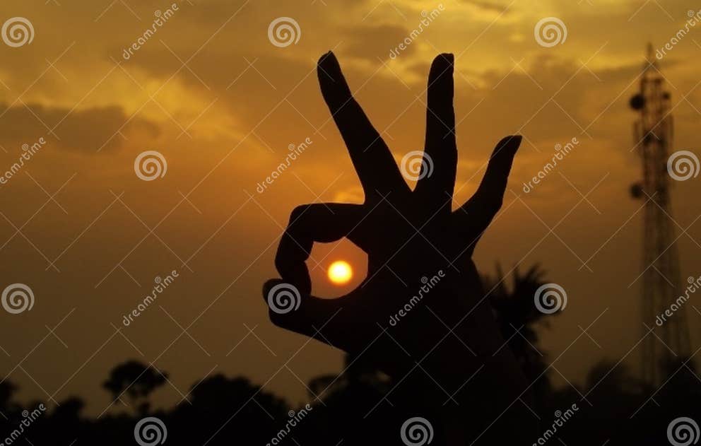 Sun through the fingers stock image. Image of darkness - 179599513