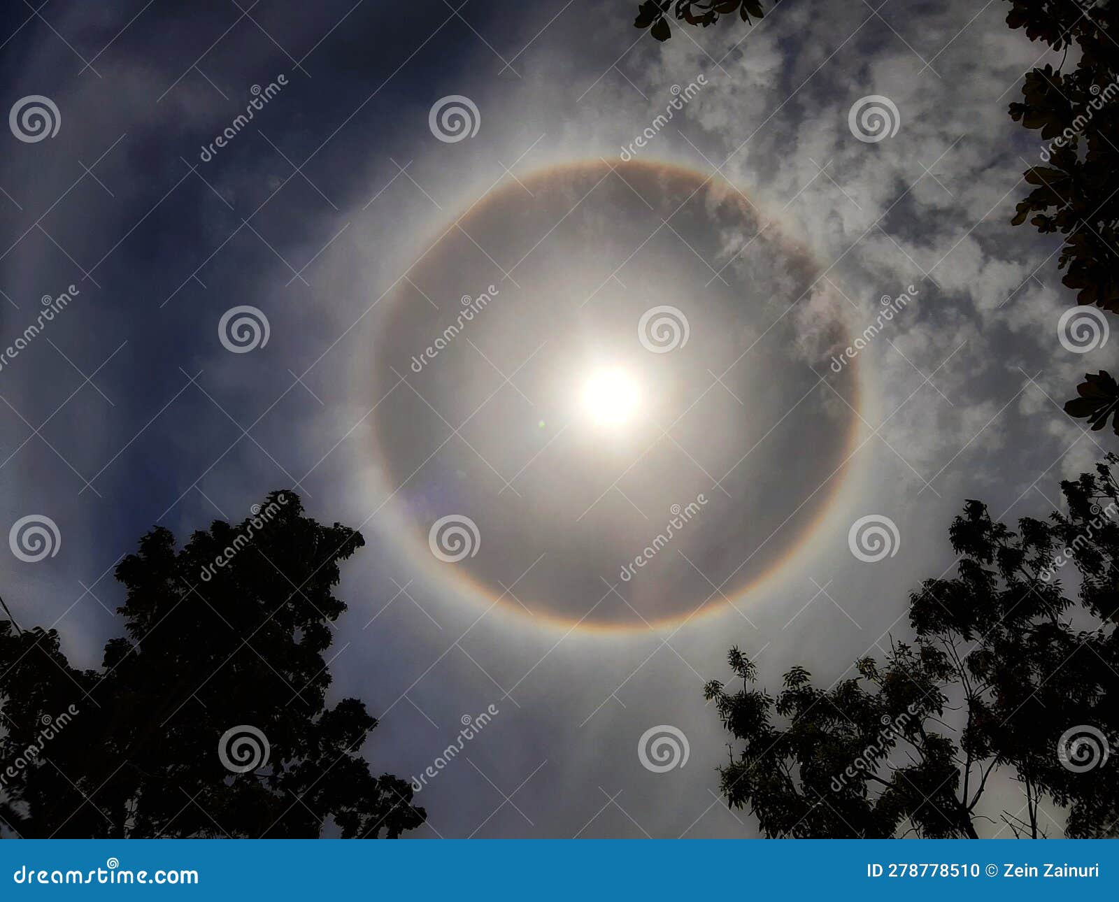 The Sun Forms a Halo Rainbow. Stock Photo - Image of night, galaxy ...